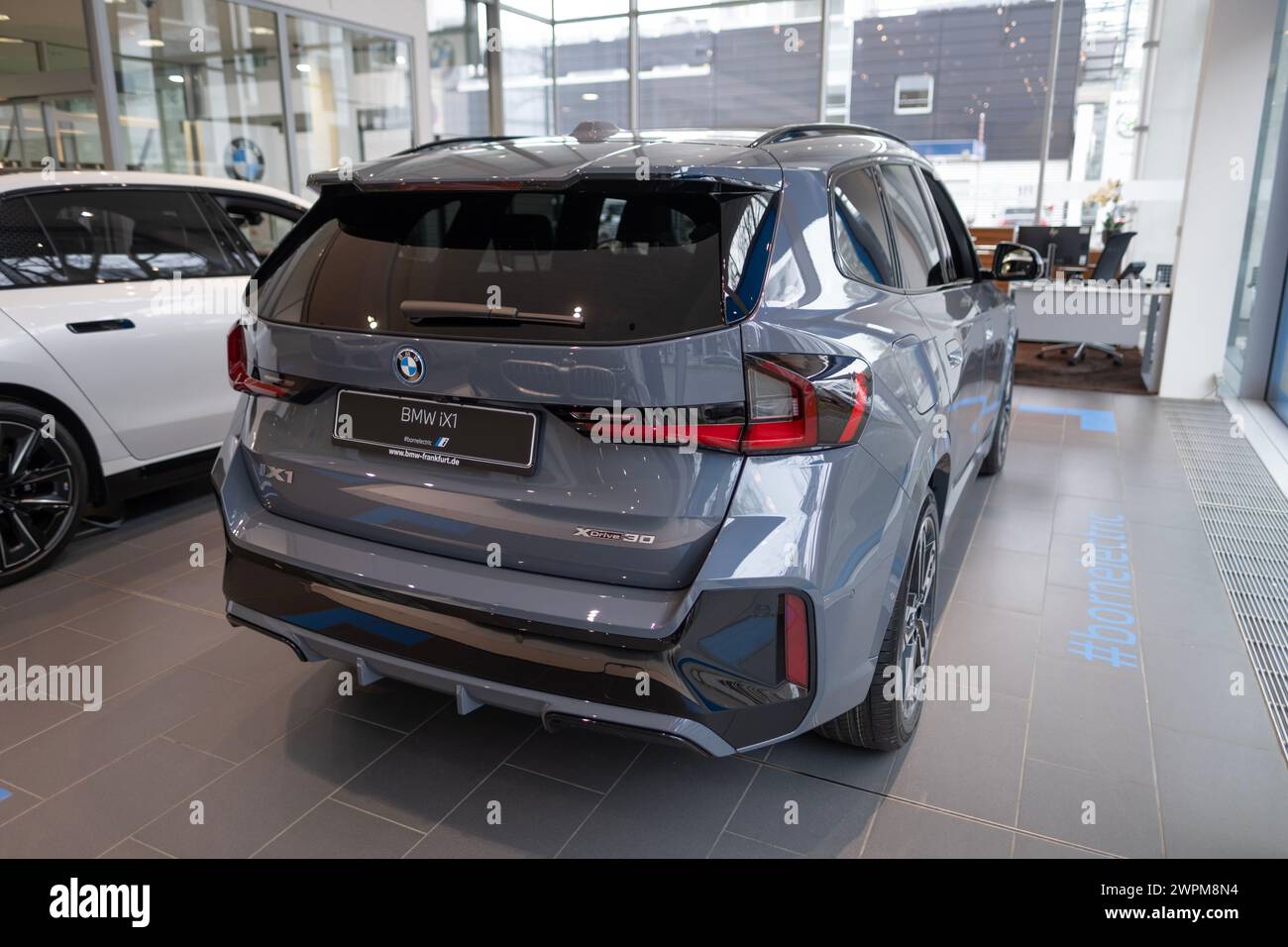 grey BMW iX1 mid-size electric SUV German manufacturer BMW AG, Powerful ...