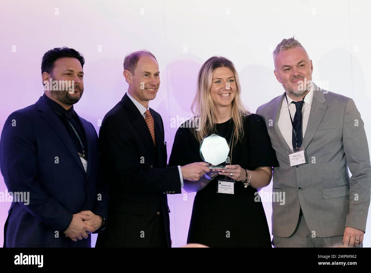 The Duke of Edinburgh (second left) presents Rachael Long and Stuart ...