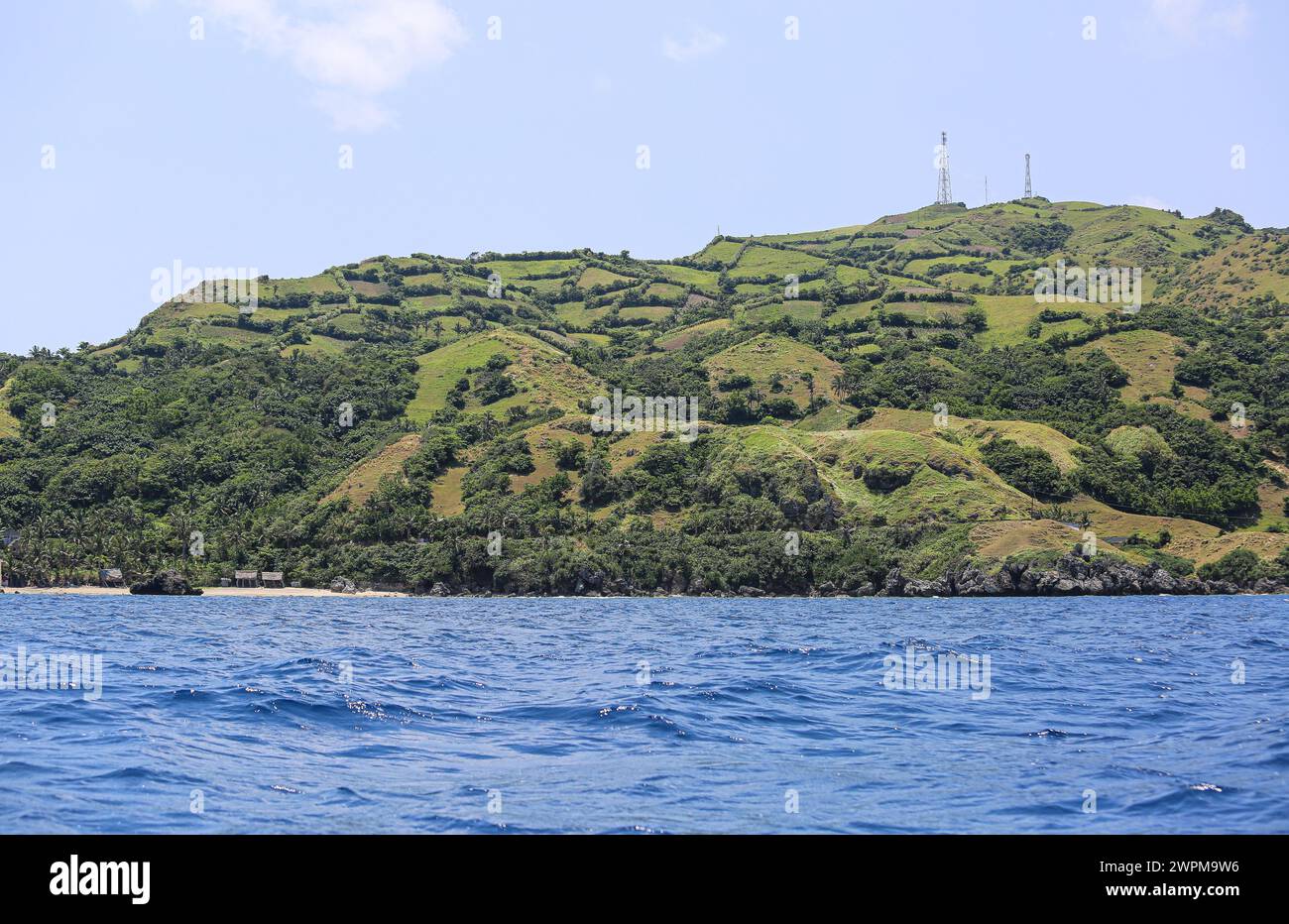 Batan, Philippines. Mar 8, 2024: Batanes hills provide natural defense ...