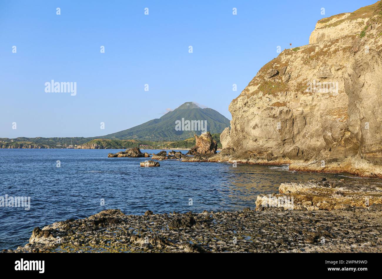 Batan, Philippines. Mar 8, 2024: Mount Iraya & Batanes cliffs, natural ...