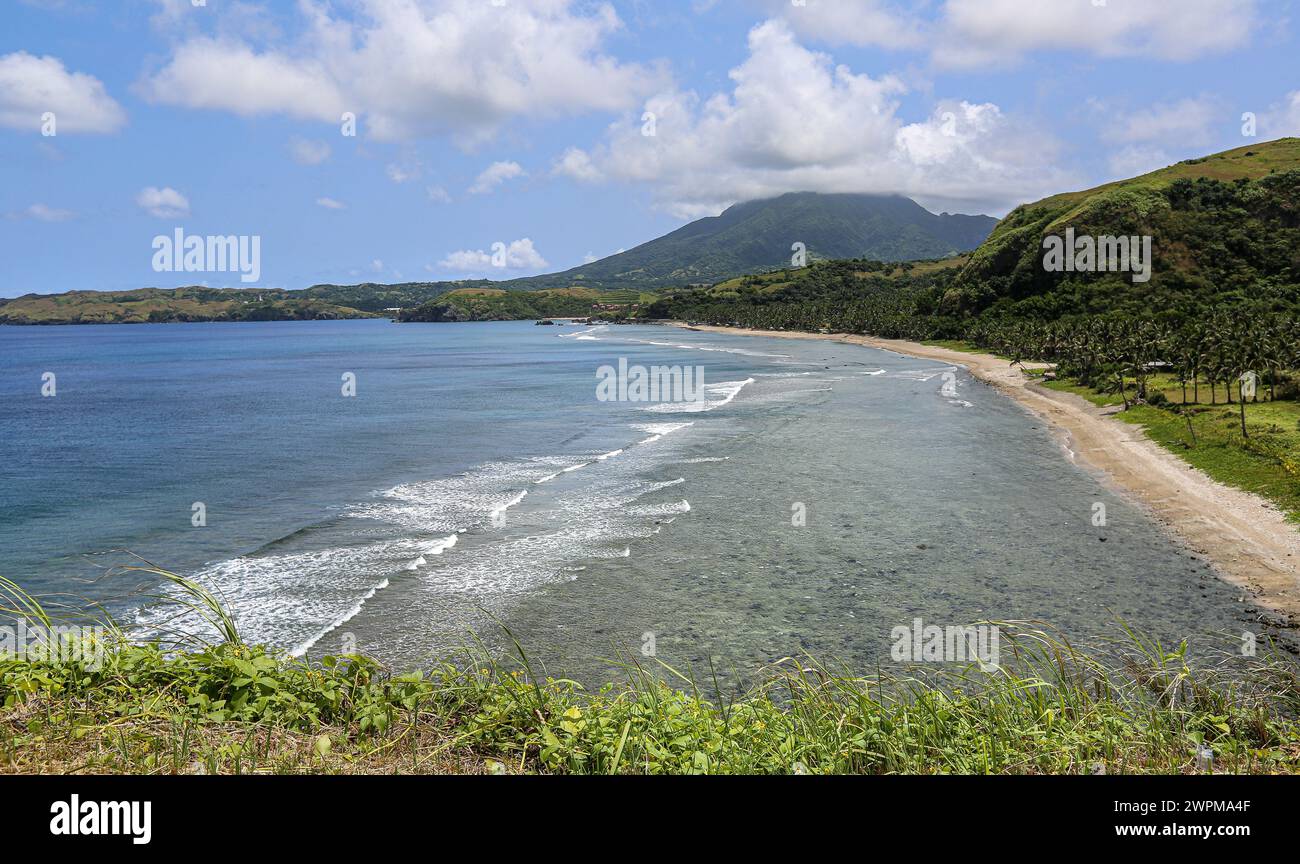 Batan, Philippines. Mar 8, 2024: Chanarian beach and Mount Iraya ...