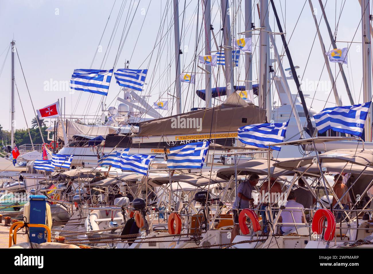 Flags greece fluttering in wind hi-res stock photography and images - Alamy