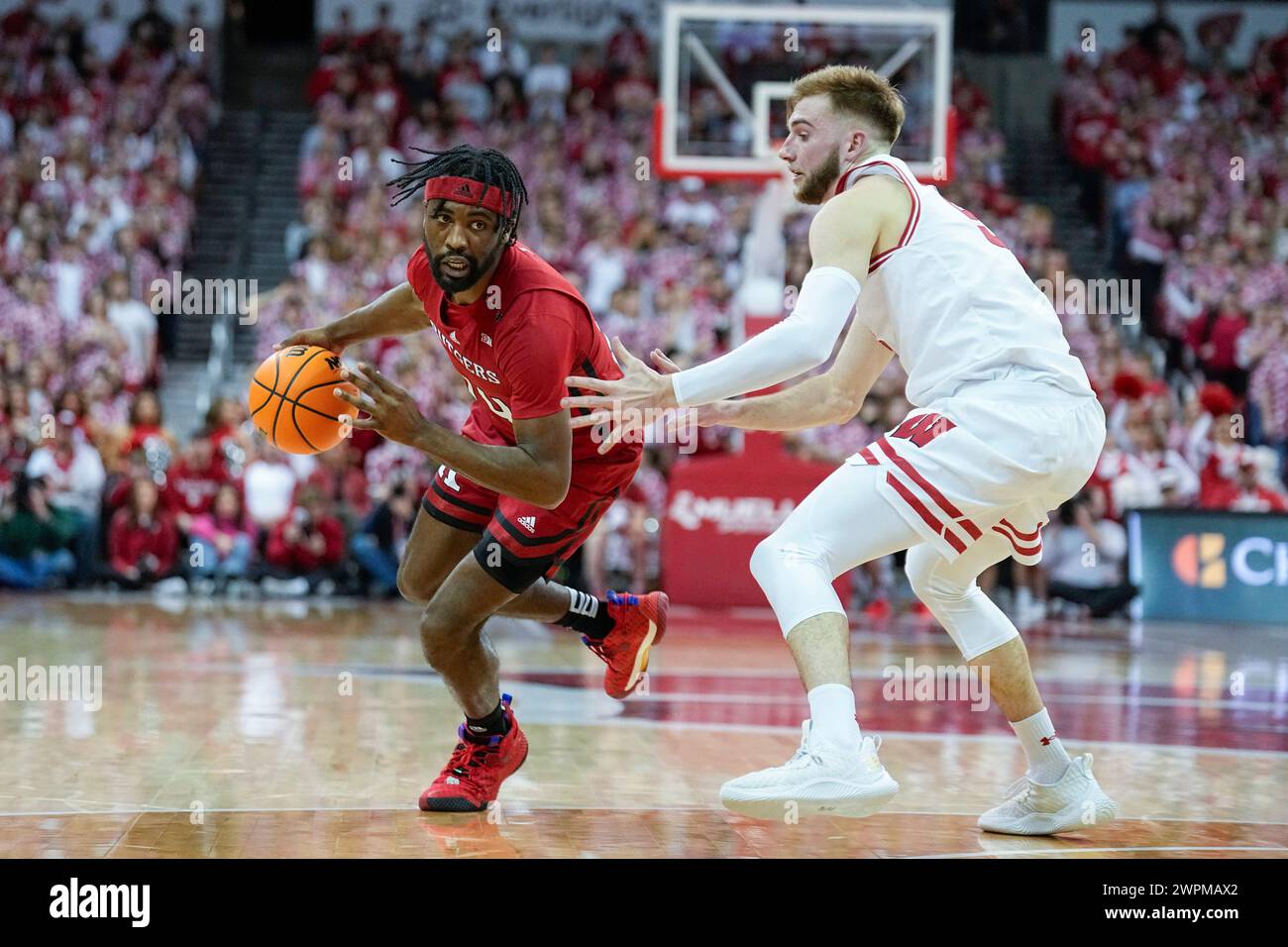 Rutgers' Austin Williams (24) against Wisconsin's Tyler Wahl, right ...
