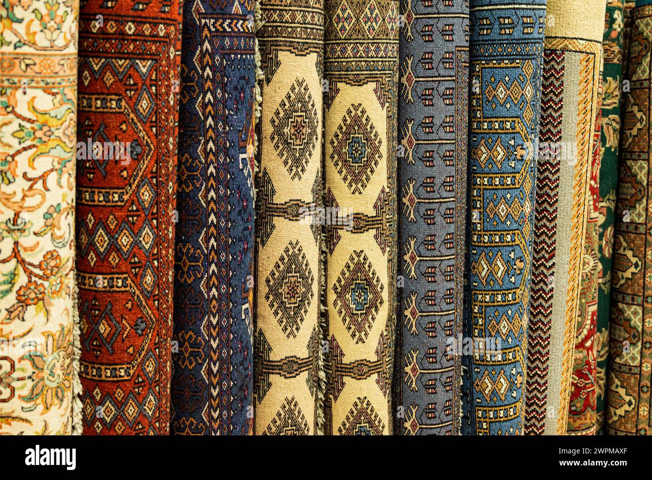 assortment of traditional hand woven Indian carpets and rugs (also ...