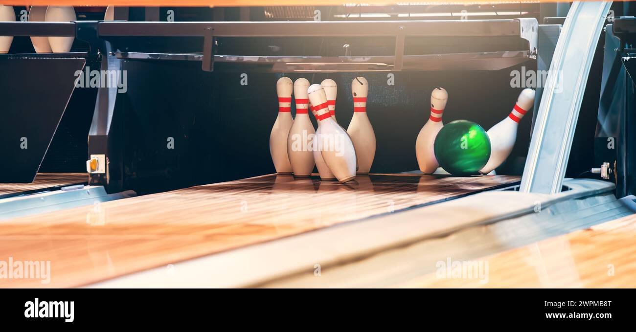 Bowling ball hits pins hi-res stock photography and images - Alamy