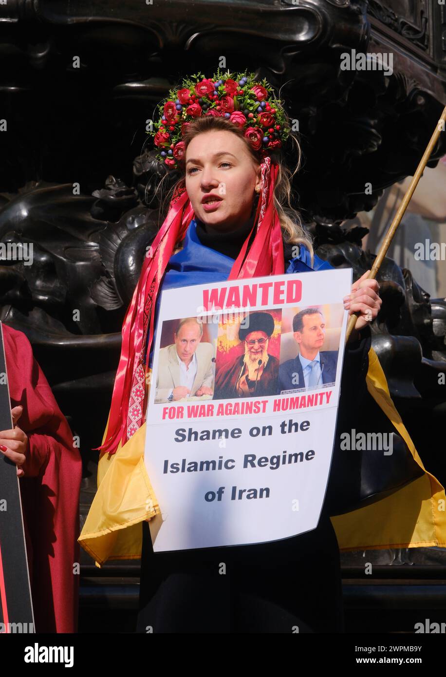 Iranian women wearing the Handmaid's Tale red robes march for ...
