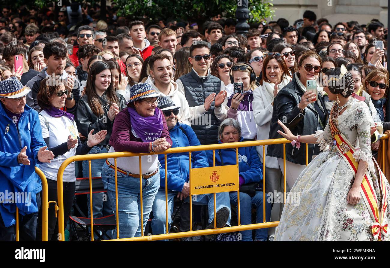A fallera waves during a 'mascletà' of the Fallas 2024, on March 8 ...