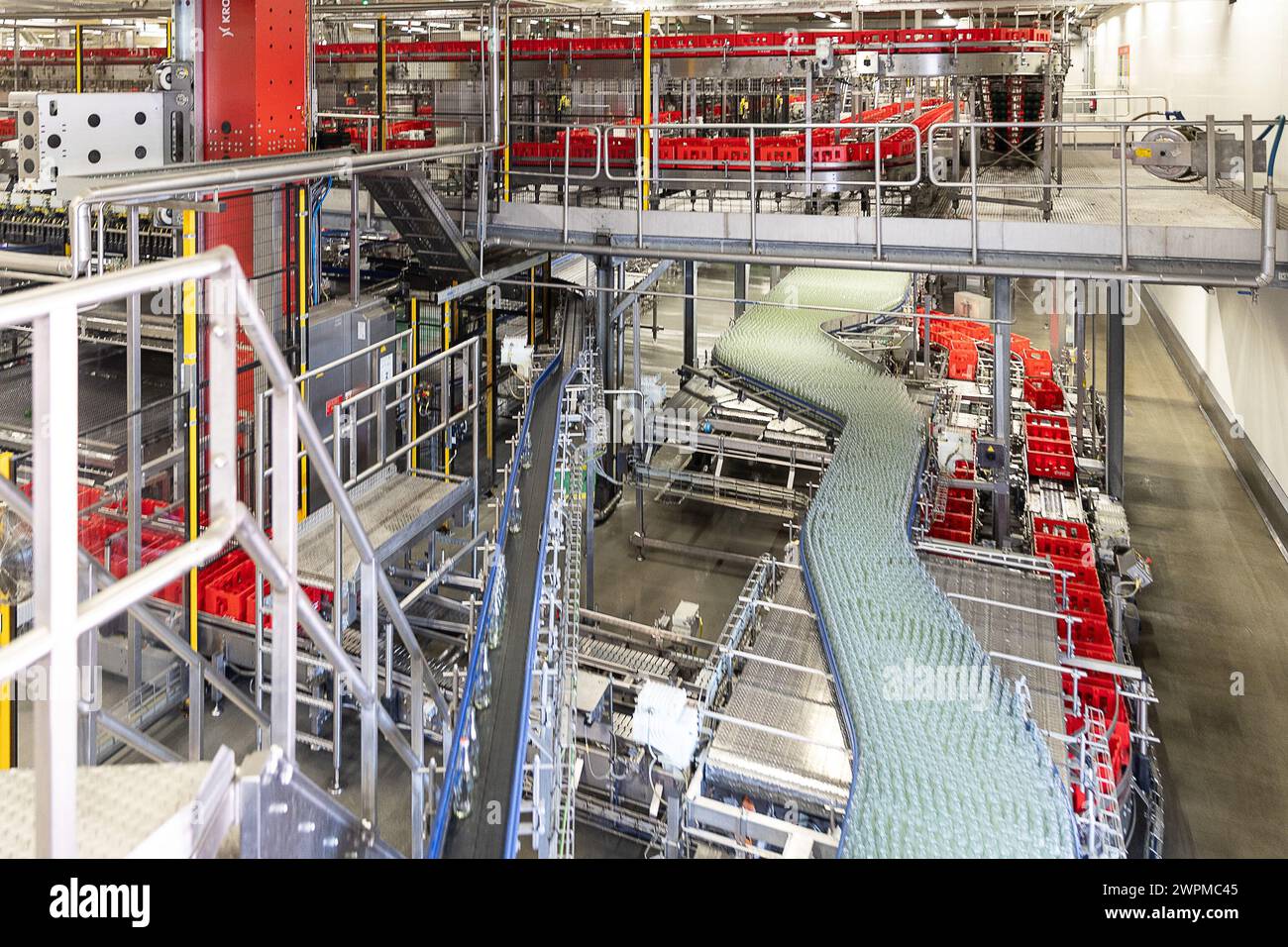 A conveyor belt, part of the bottling installation, seen during a visit ...