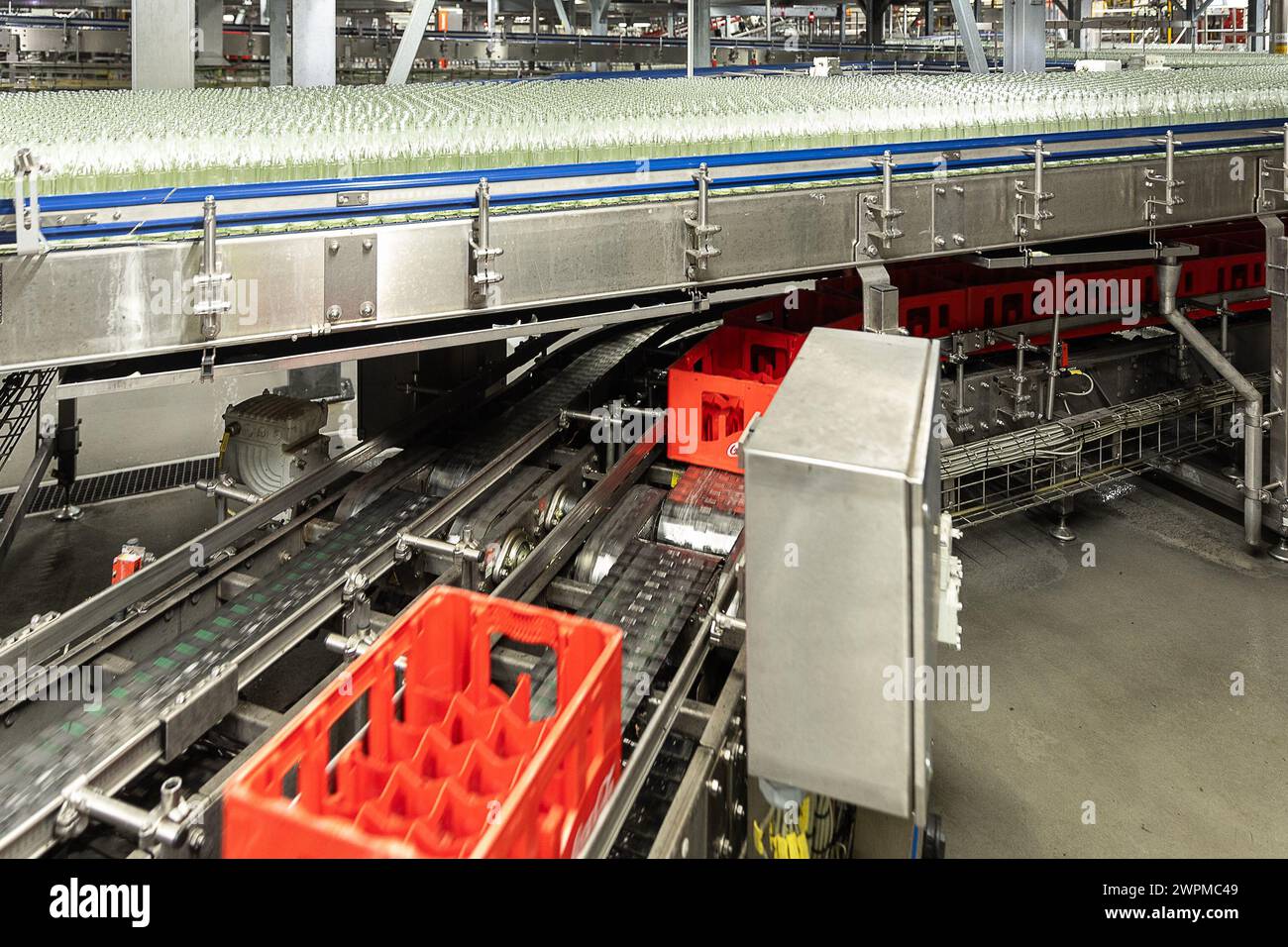 Gent, Belgium. 08th Mar, 2024. A conveyor belt, part of the bottling ...