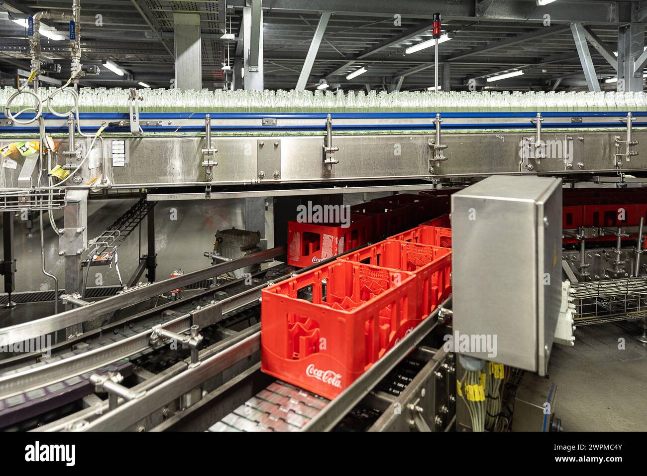 Gent, Belgium. 08th Mar, 2024. A conveyor belt, part of the bottling ...