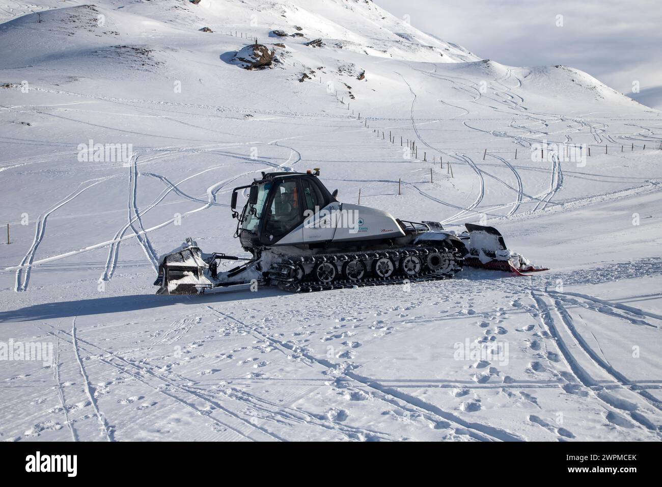 A ratrak operating at Mont-Cenis, a massif of the French Alps Stock ...