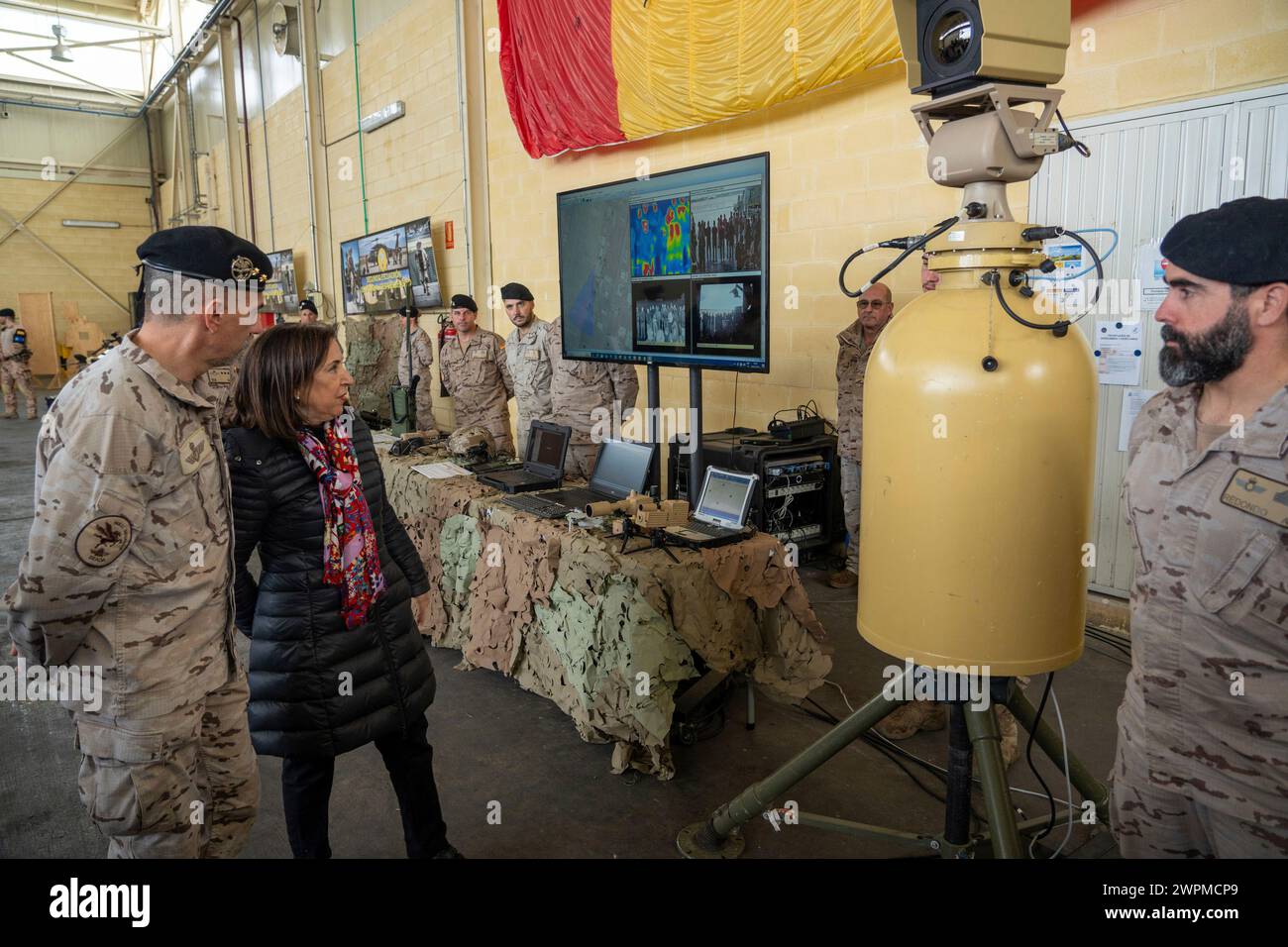 Defense Minister Margarita Robles observes different types of weaponry ...