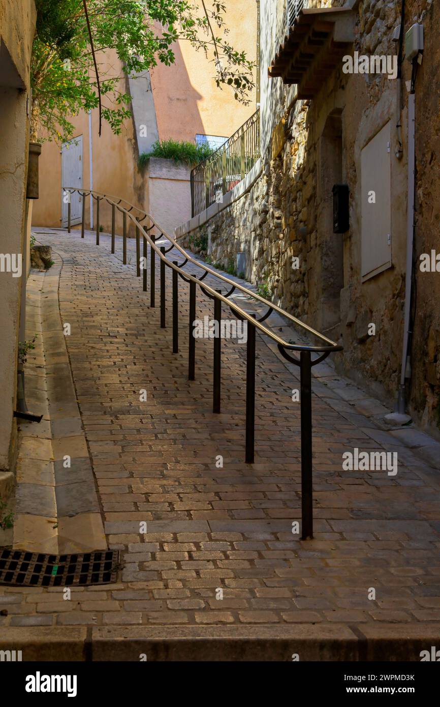 Iron hand rail on steep Provencal footpath Stock Photo - Alamy