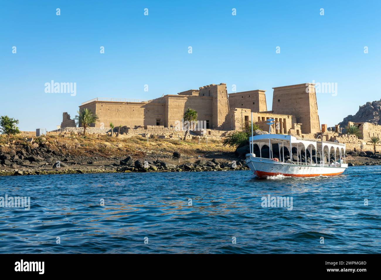 View of the ancient Philae temple from the Nile river in Aswan, Egypt ...