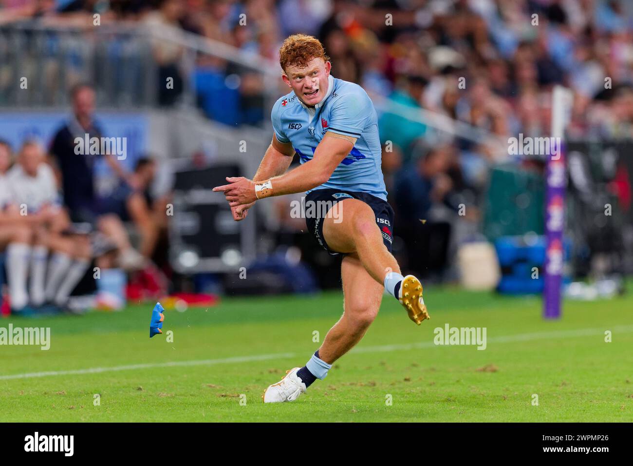 Sydney, Australia. 08th Mar, 2024. Tane Edmed of the Waratahs kicks at ...