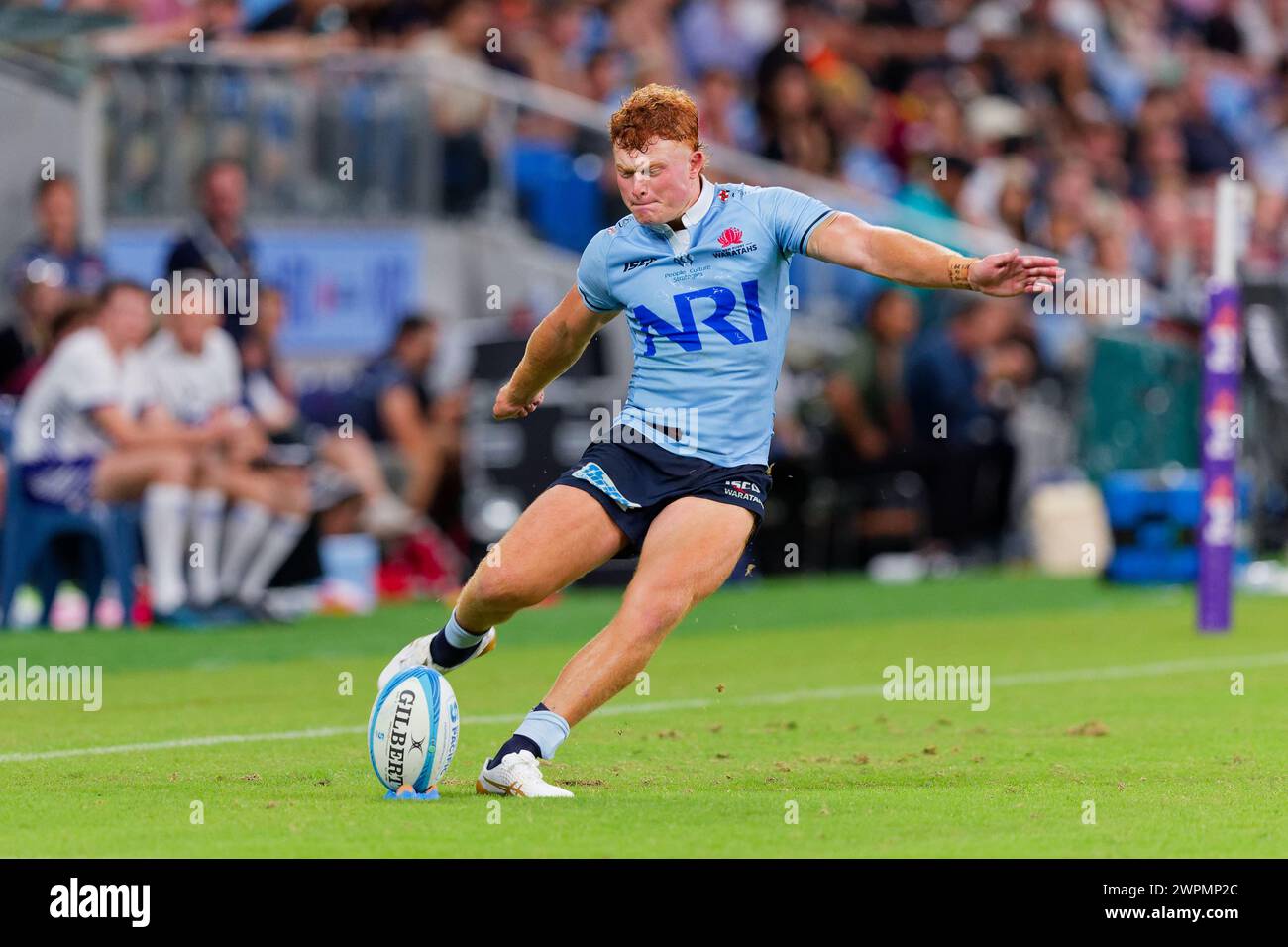 Sydney, Australia. 08th Mar, 2024. Tane Edmed of the Waratahs kicks at ...