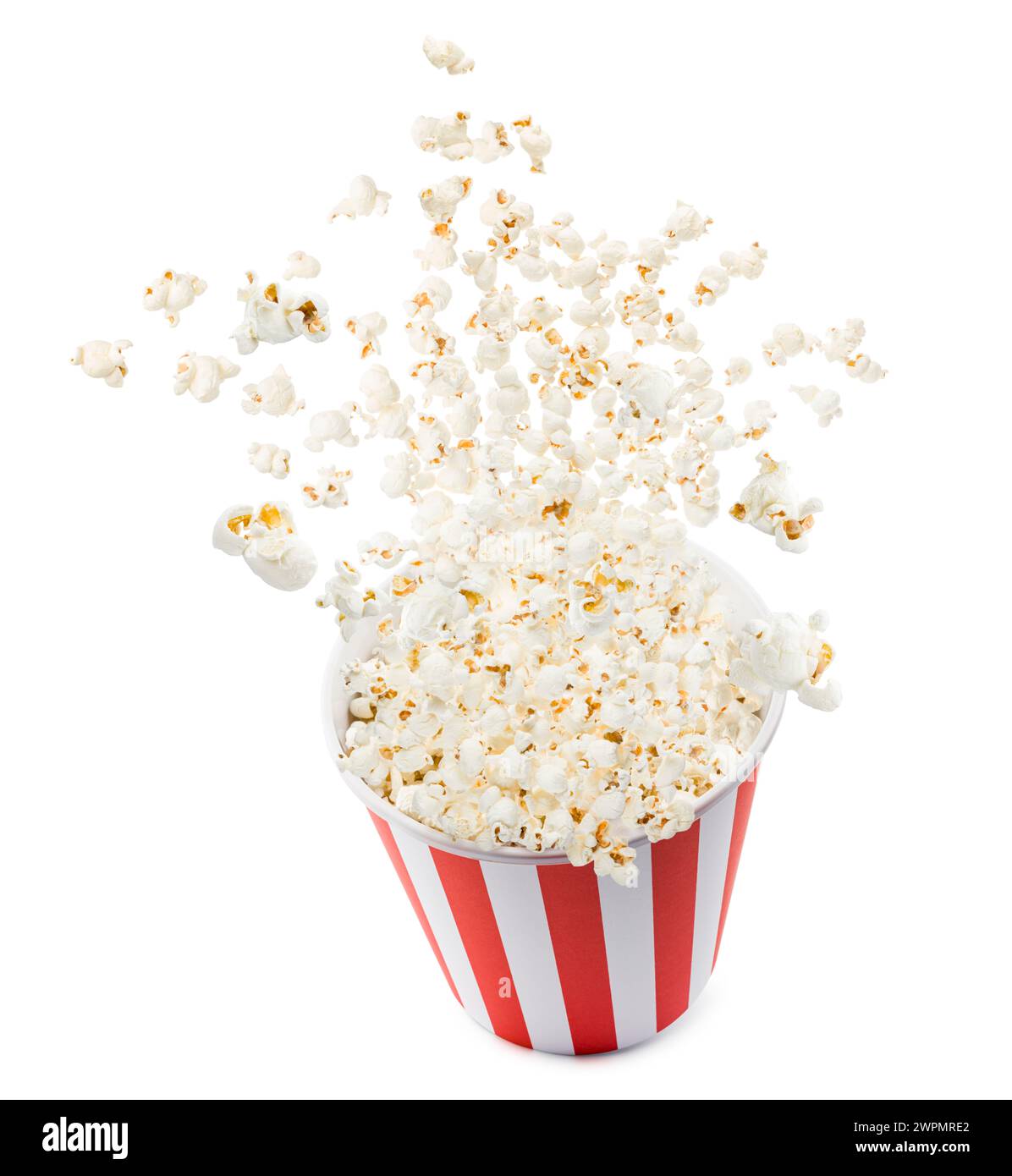 Flying popcorn from striped bucket isolated on black background Stock ...