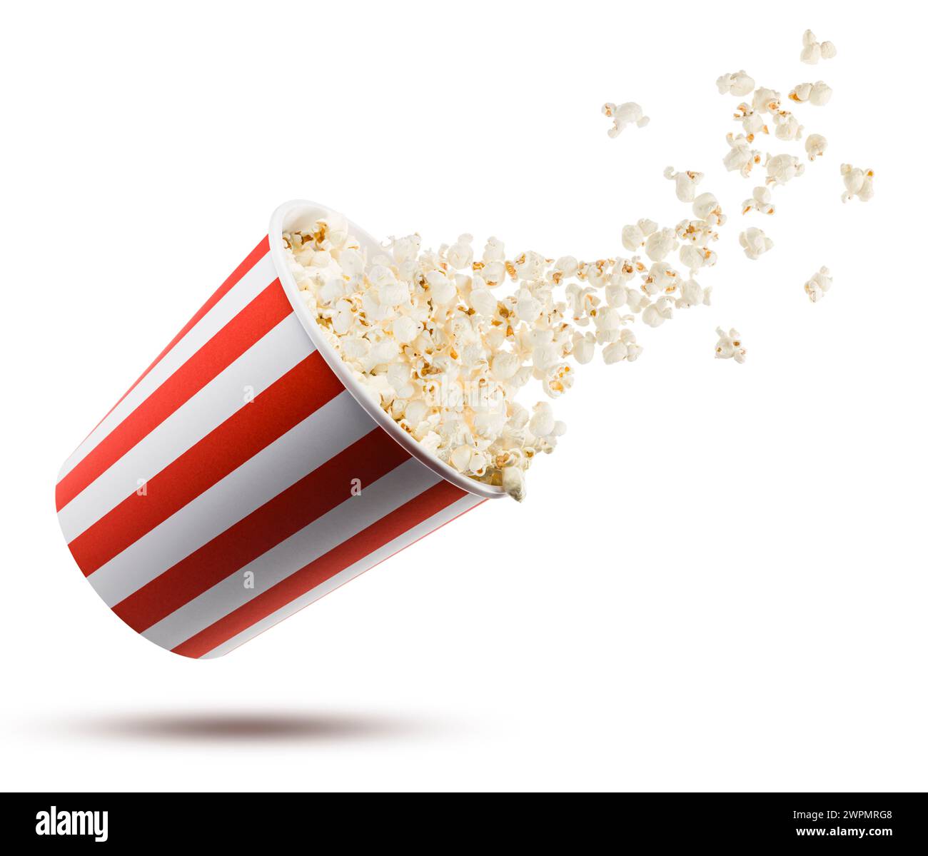 Popcorn flying from red and white striped container, isolated on white ...