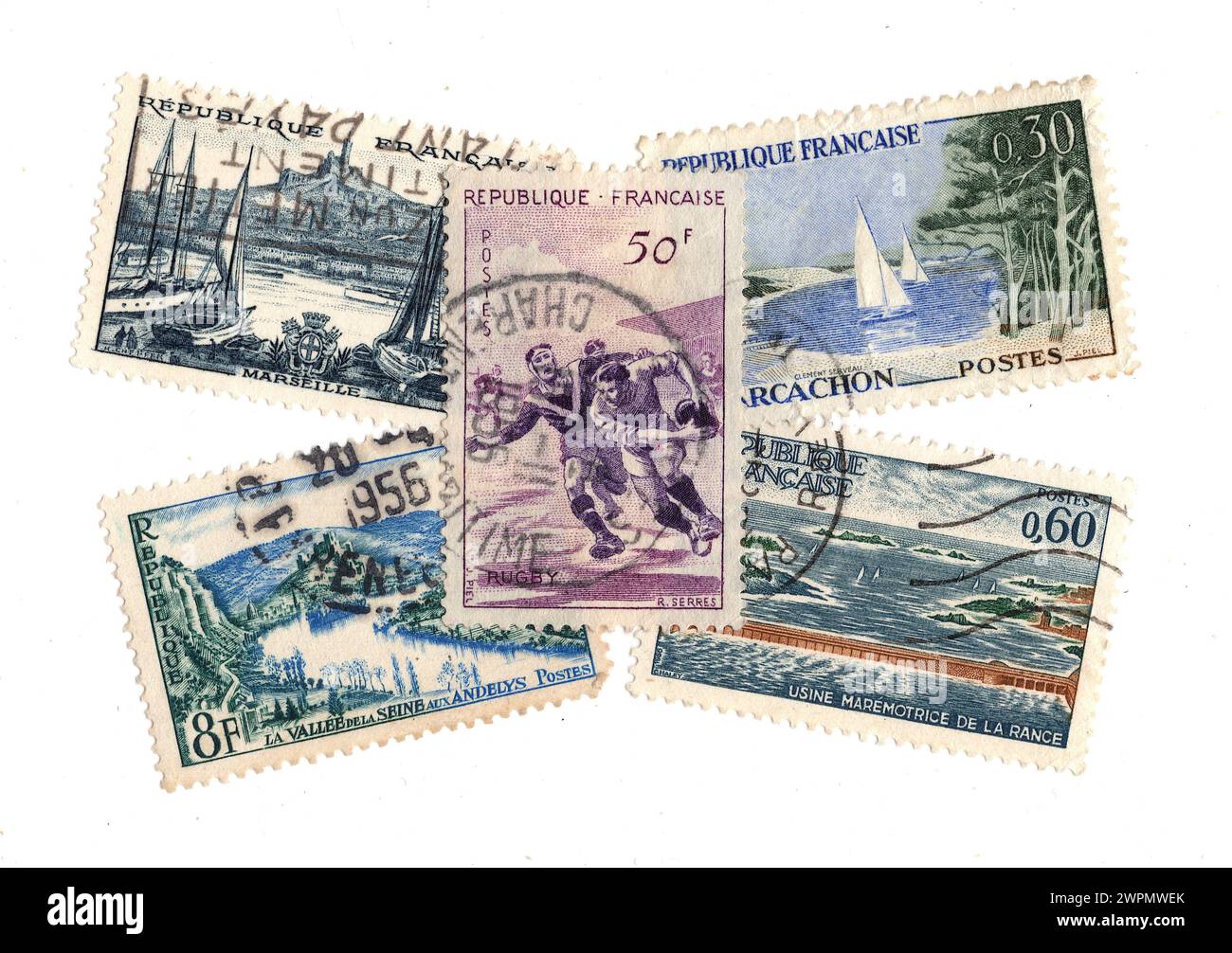 A montage of vintage postage stamps from France isolated on a white ...