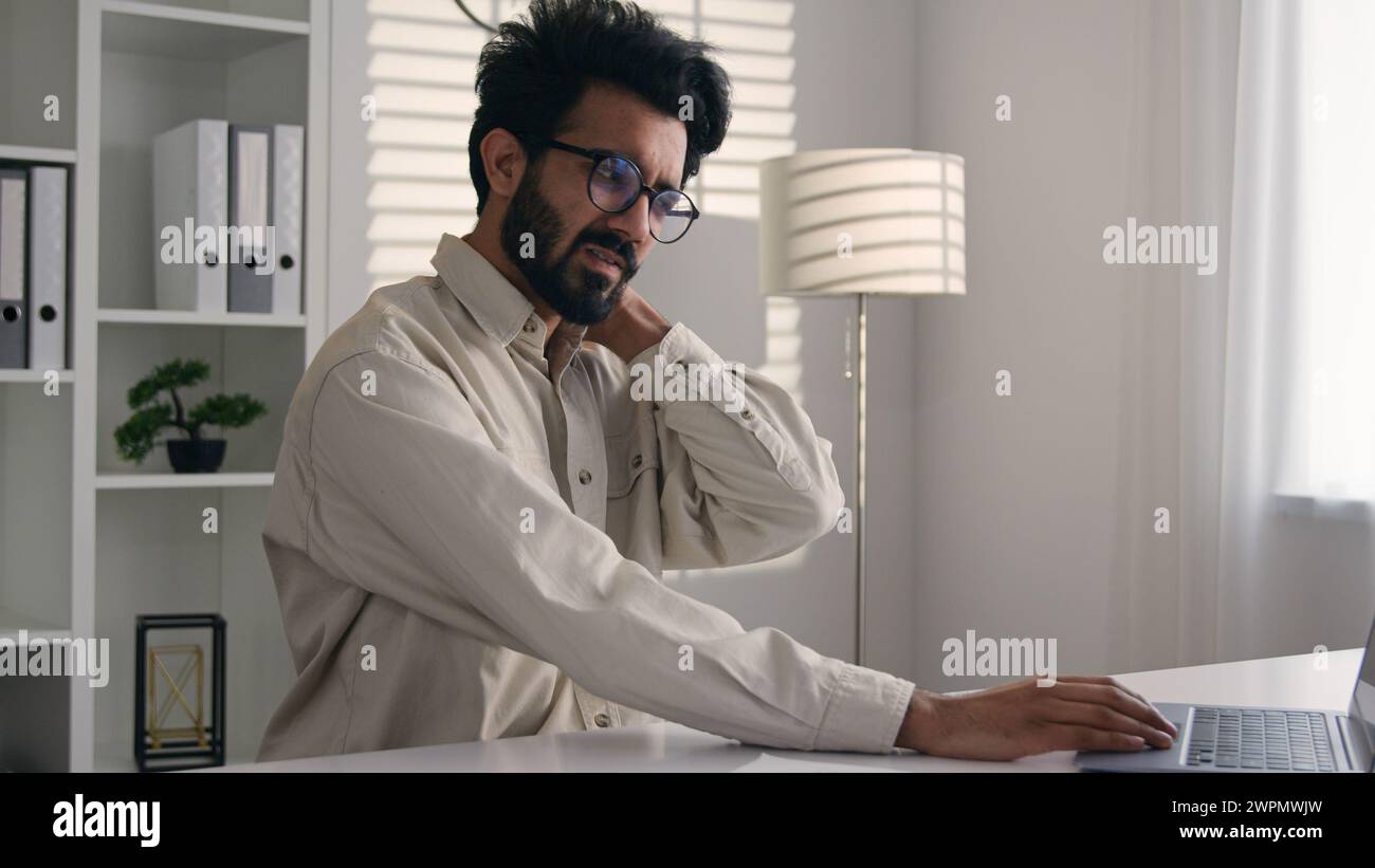 Tired displeased Indian Arabian business man businessman office manager ...