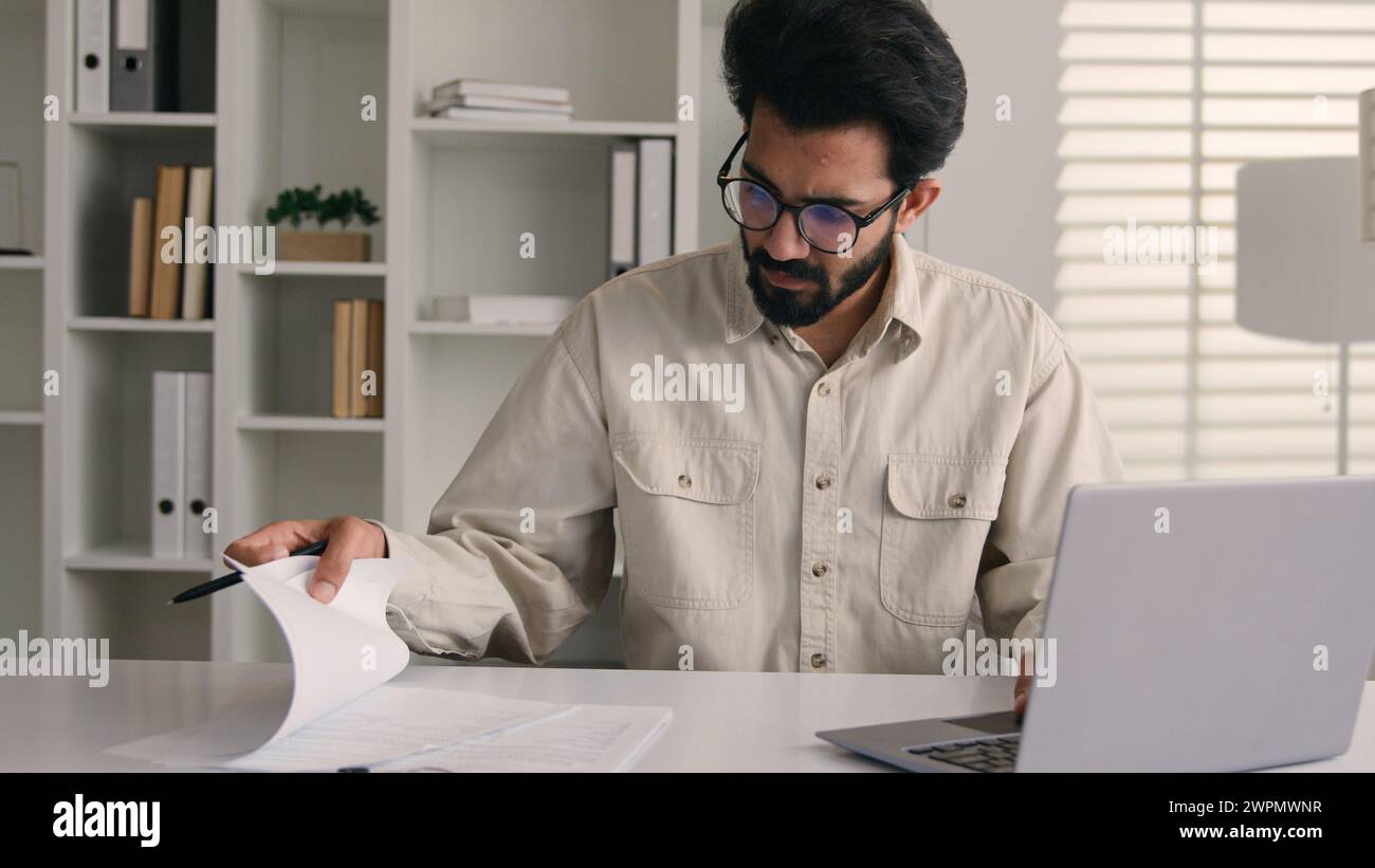 Indian businessman signing document hi-res stock photography and images ...