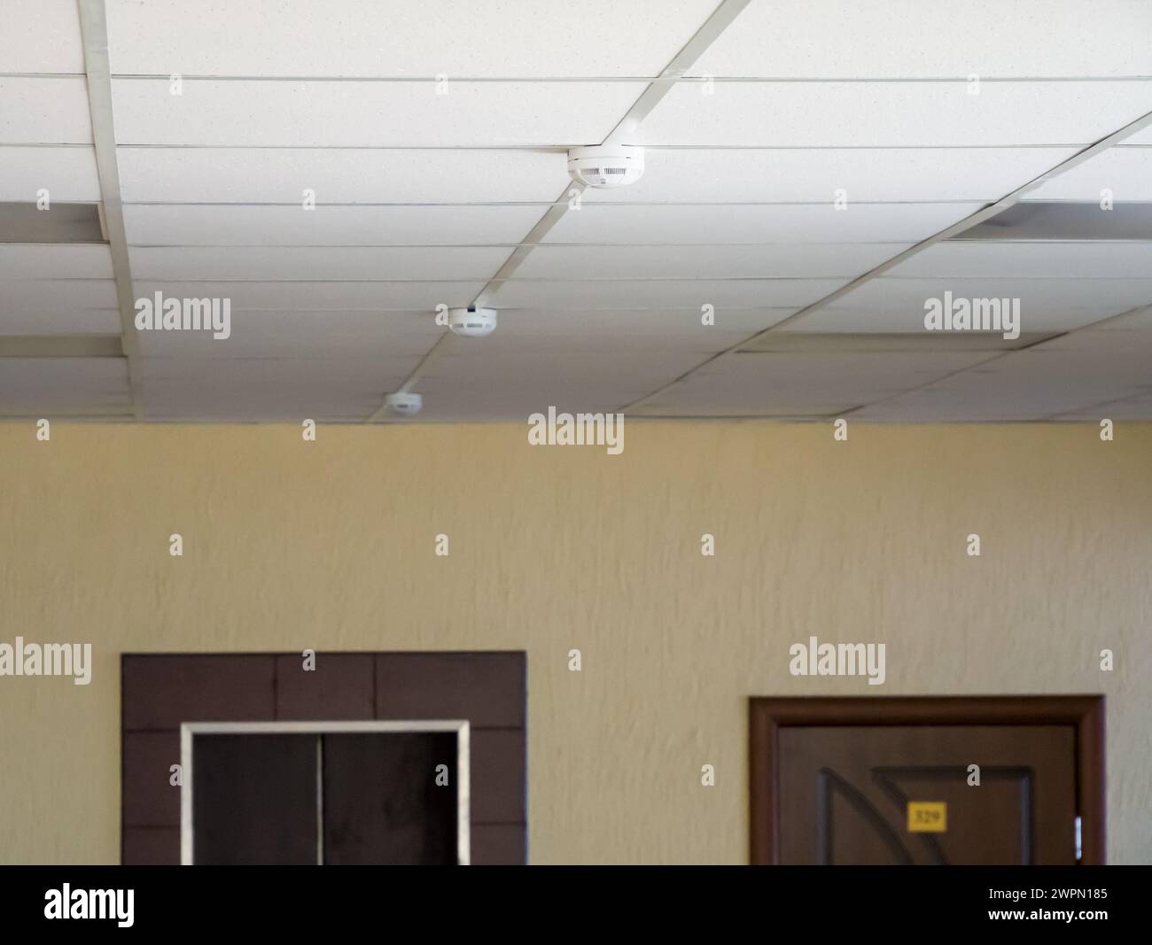 Fire alarm sensors on the ceiling of the room Stock Photo - Alamy