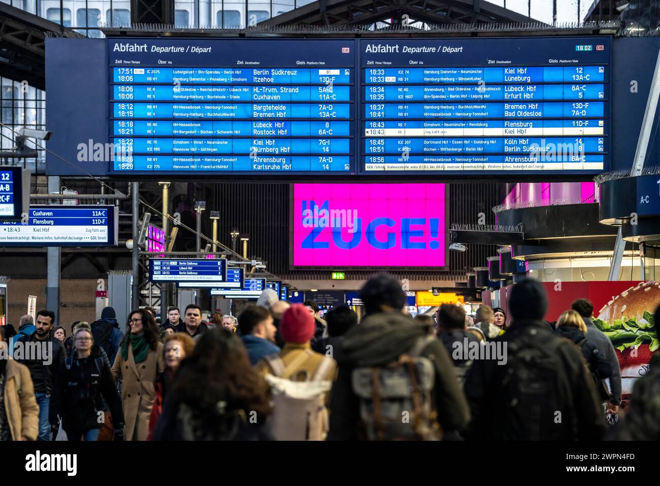 Display boards at Hamburg central station, evening rush hour, before ...