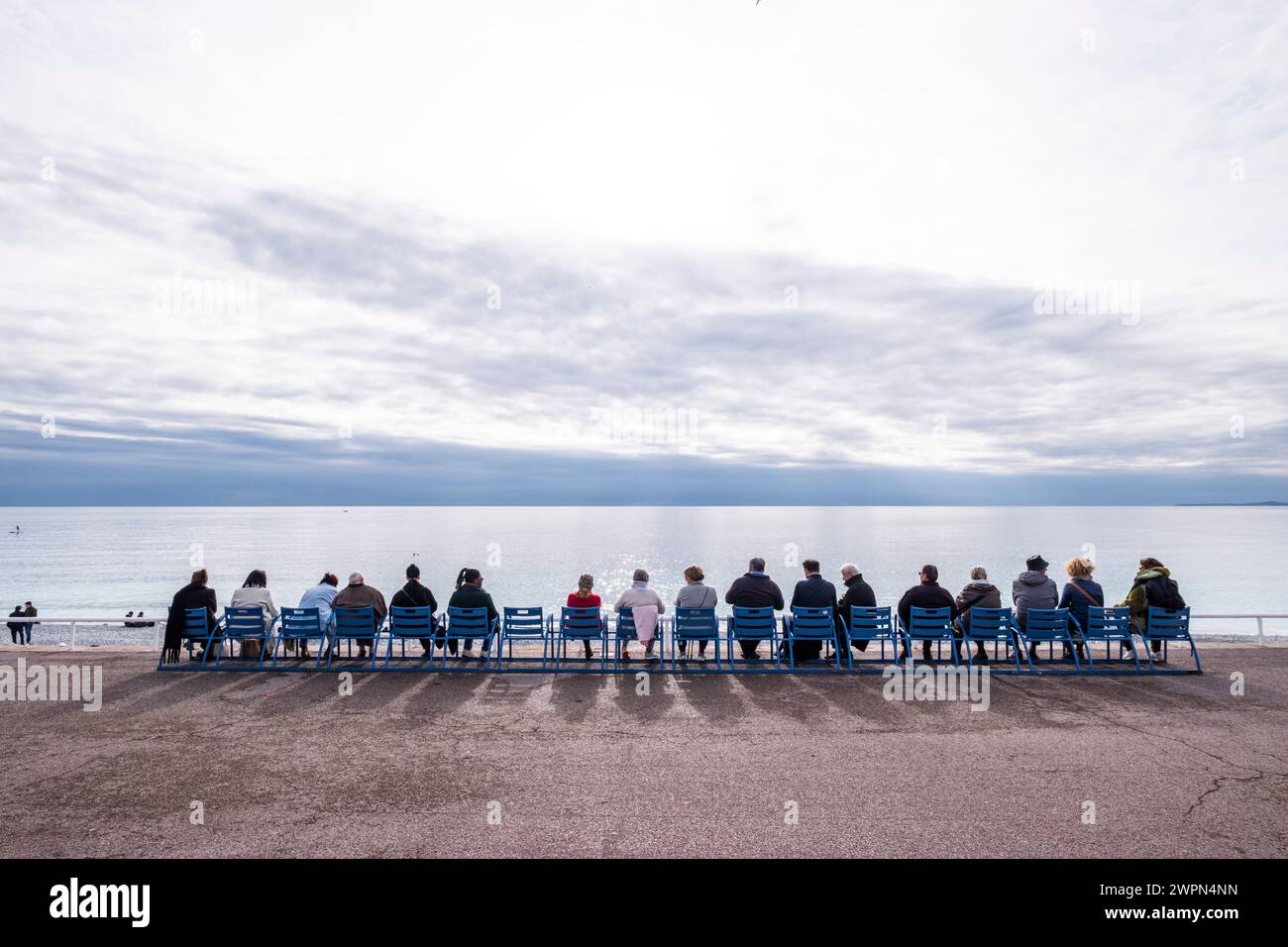 People on the beach promenade of Nice, Nice in winter, South of France ...