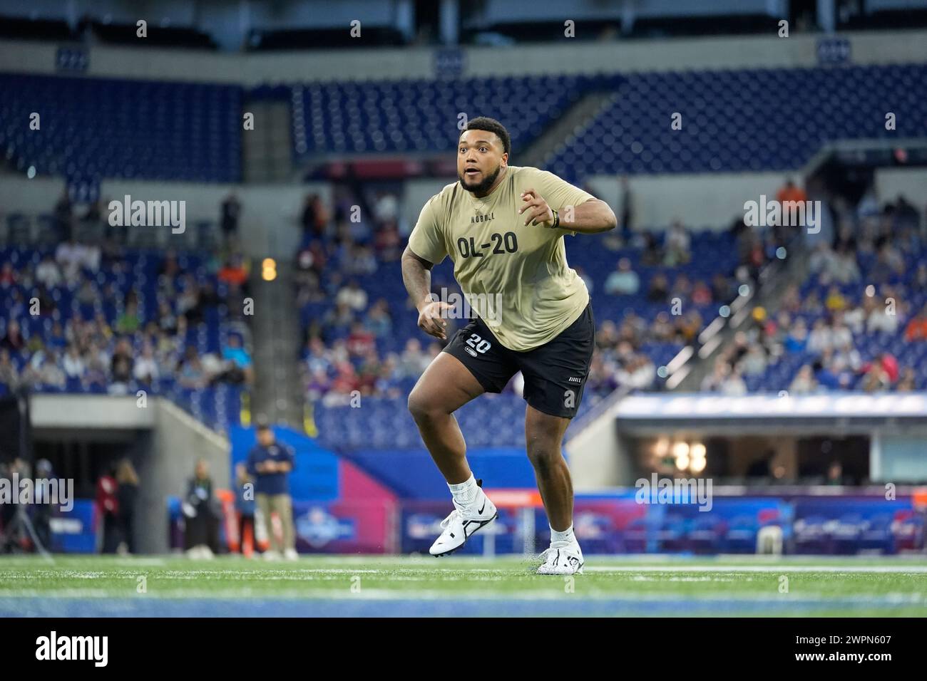 Notre Dame offensive lineman Blake Fisher runs a drill at the NFL ...