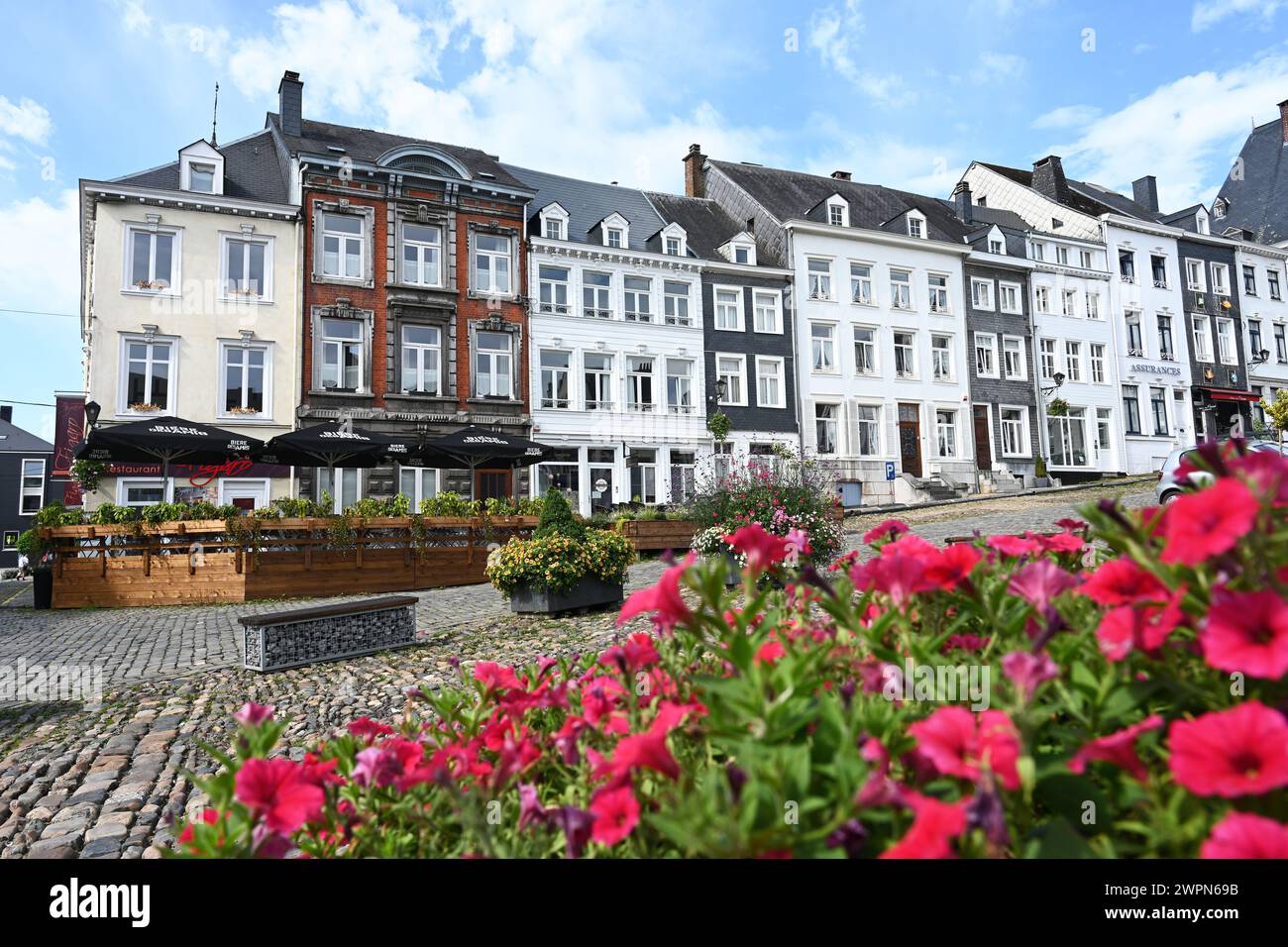 Stavelot town square with restaurants and flower boxes Stock Photo - Alamy