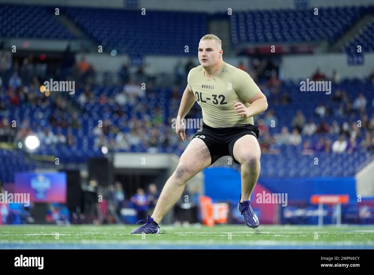 Holy Cross offensive lineman CJ Hanson runs a drill at the NFL football ...