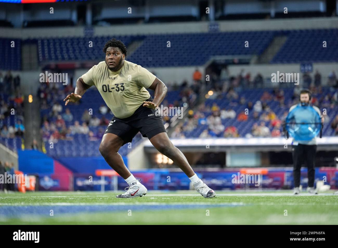 Connecticut offensive lineman Christian Haynes runs a drill at the NFL ...