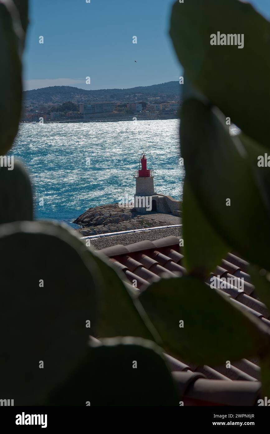the port of sanary sur mer, the quays, the lighthouse, in the var on a ...