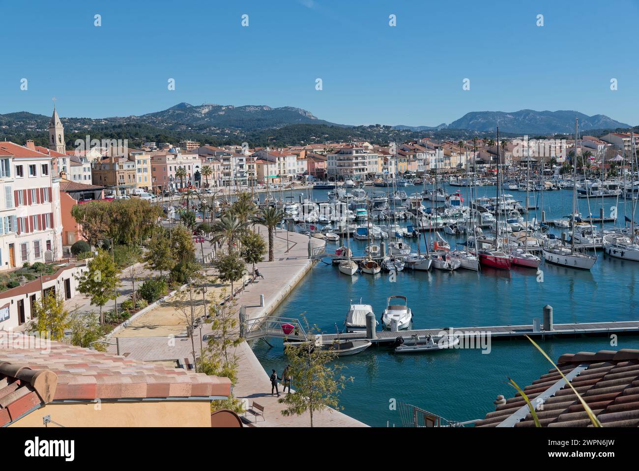 the port of sanary sur mer, the quays, the lighthouse, in the var on a ...
