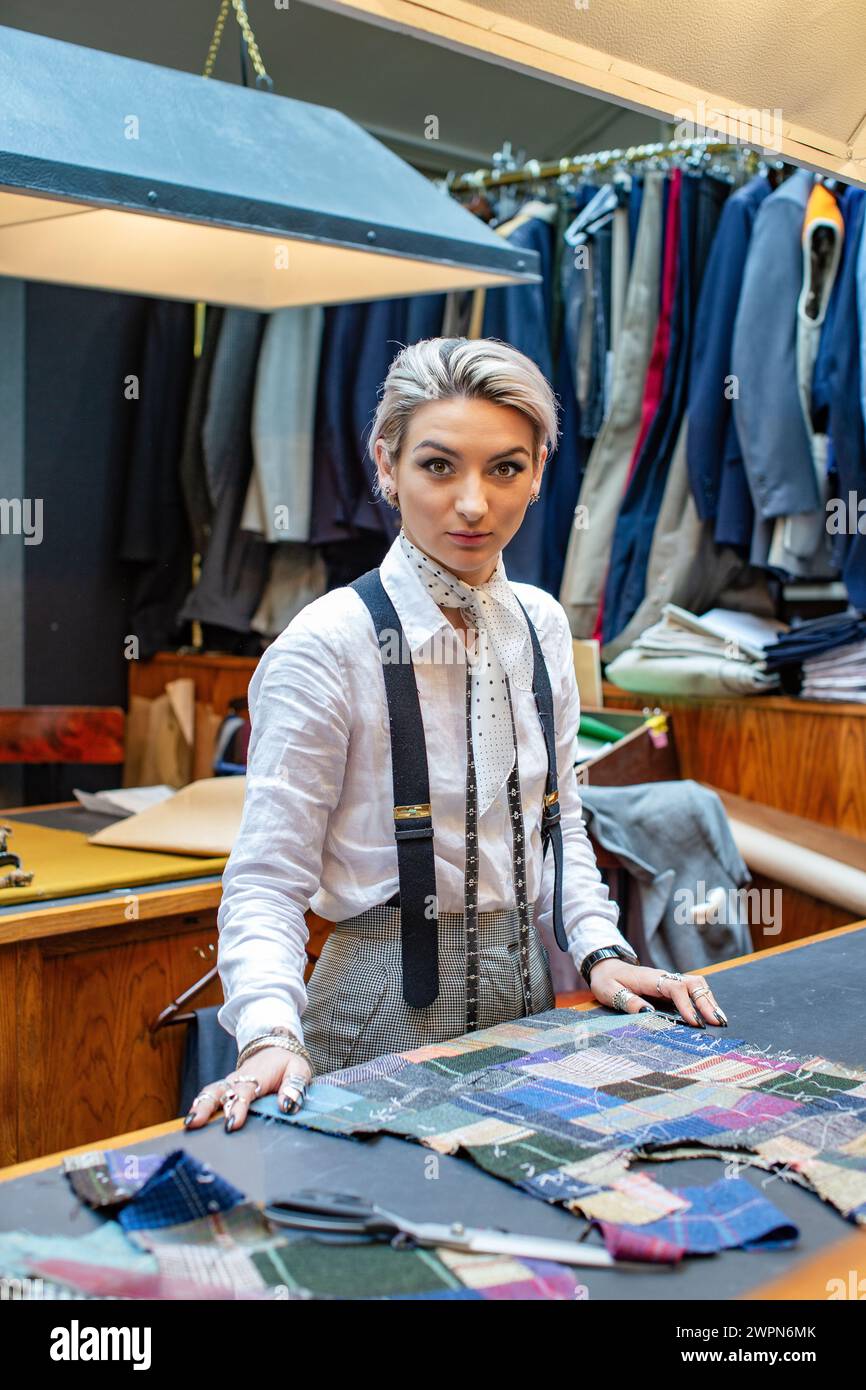 Female tailor at Huntsman Bespoke tailor at ,Savile Row, London Stock ...