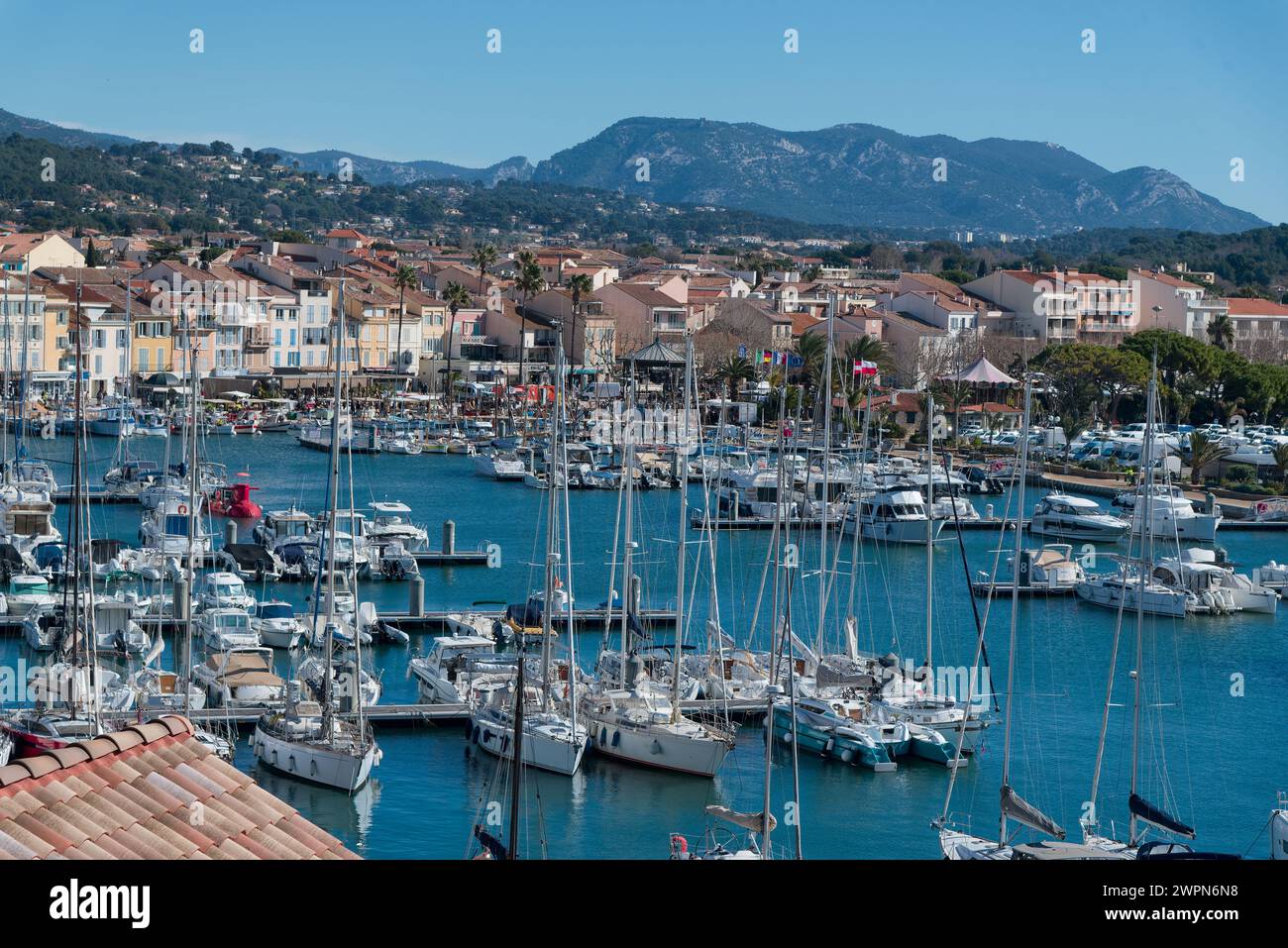 the port of sanary sur mer, the quays, the lighthouse, in the var on a ...