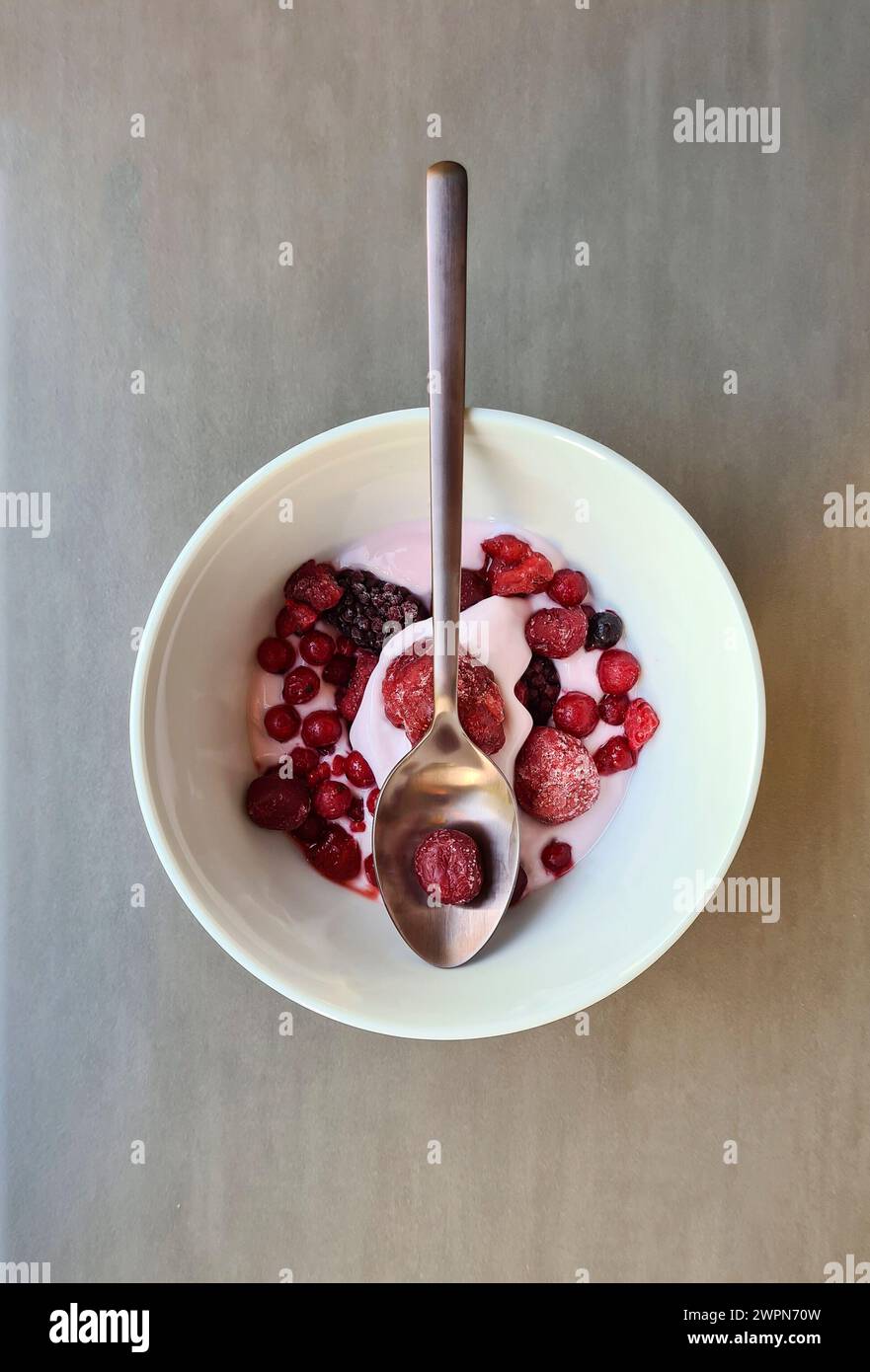 Dessert with raspberry yogurt and frozen fruit as an afternoon ...