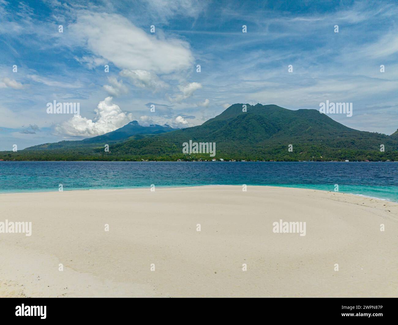 Shoreline of white sand beach with transparent sea waves. White Island ...