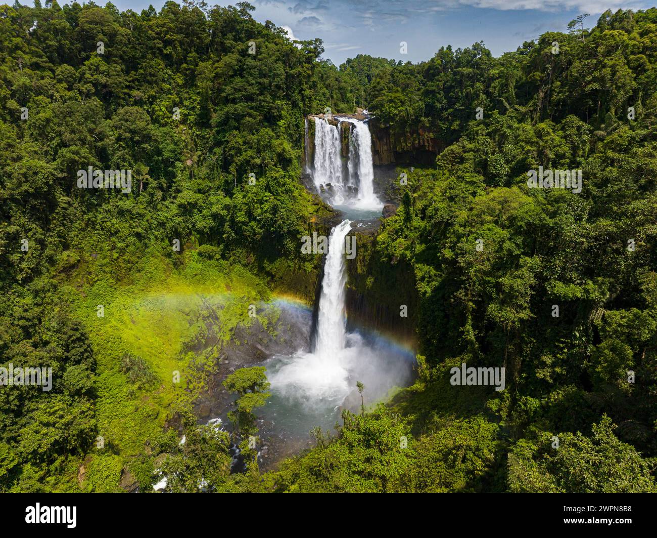 Tropical landscape with beautiful water splash from Limunsudan Falls ...
