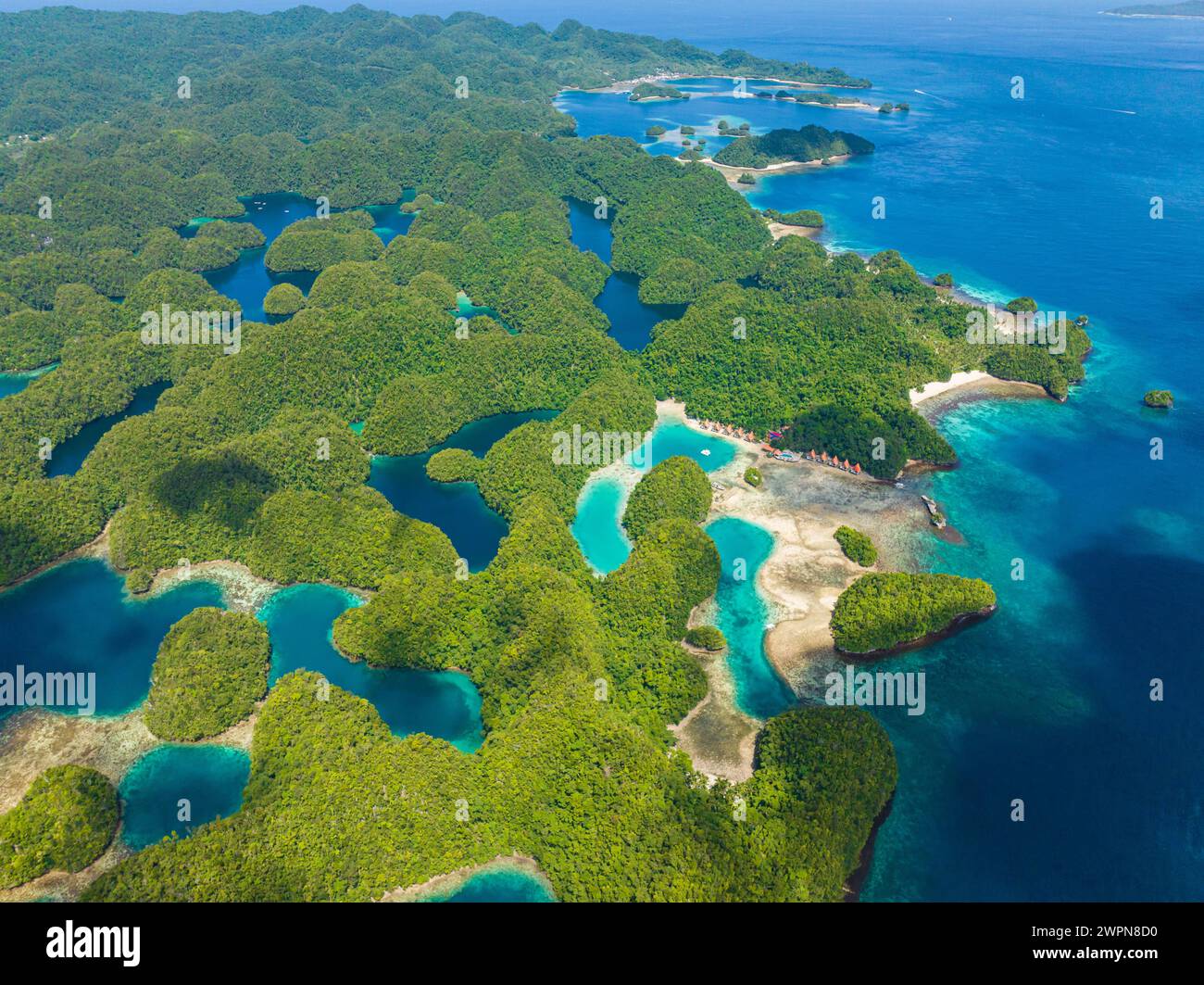 Top view of Deep blue sea around the tropical island. Turquoise water ...
