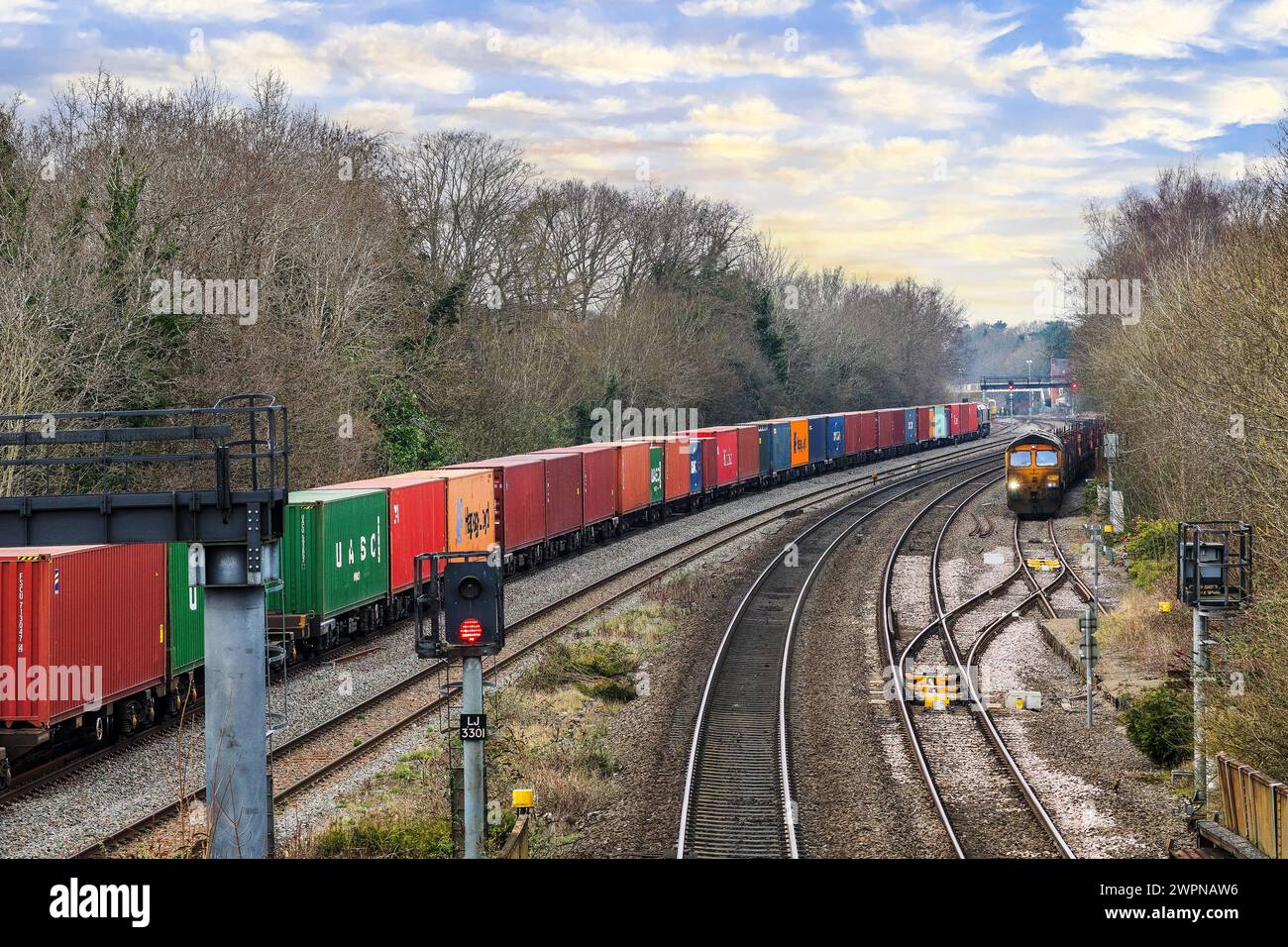 Goods train carrying freight containers hi-res stock photography and images - Alamy