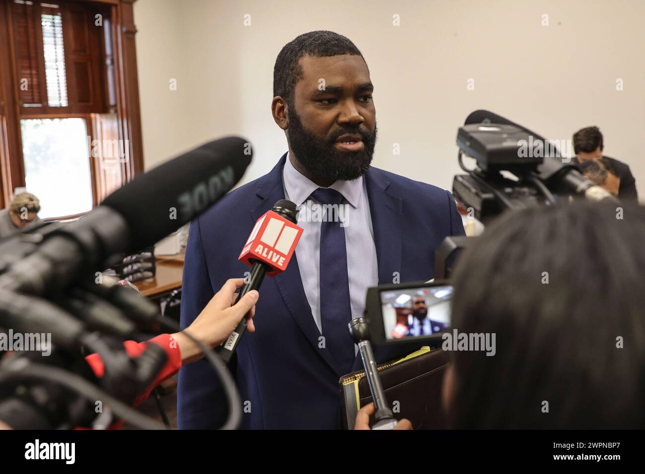 Attorney Christian Wise Smith talks to the media after filing paperwork ...