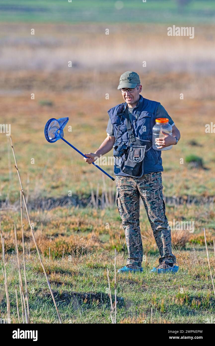 Researcher, scientist who collects samples in the field Stock Photo - Alamy