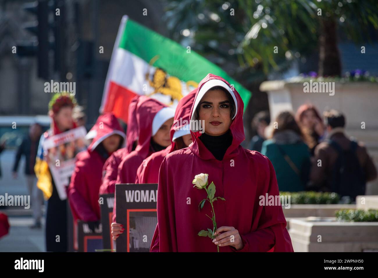 London, UK. 08th Mar, 2024. Protesters - dressed as handmaids - hold ...