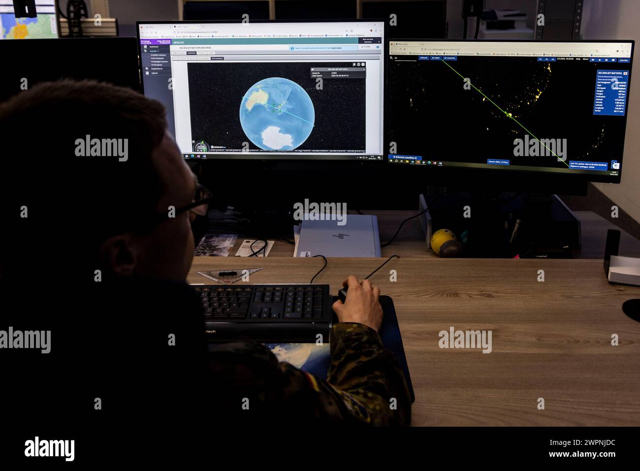 Uedem, Germany. 08th Mar, 2024. A Bundeswehr soldier sits in front of ...