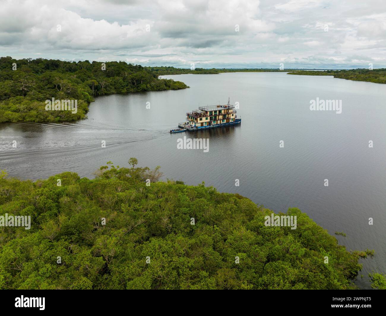 Amazon in the Brazilian rainforest with small boutique ship Stock Photo ...