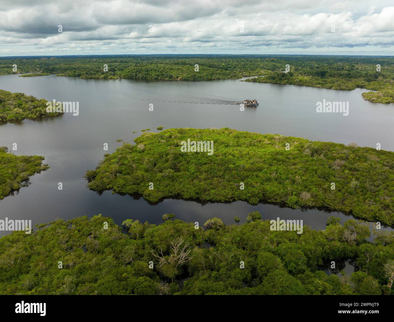 Amazon in the Brazilian rainforest with small boutique ship Stock Photo ...