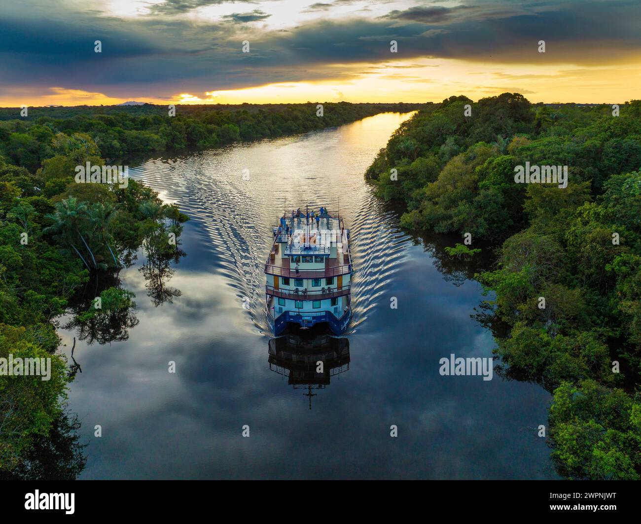 Amazon in the Brazilian rainforest with small boutique ship Stock Photo ...