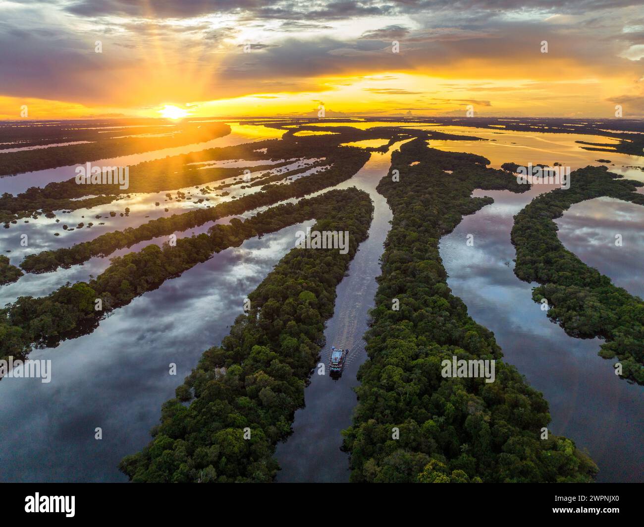 Amazon in the Brazilian rainforest with small boutique ship Stock Photo ...