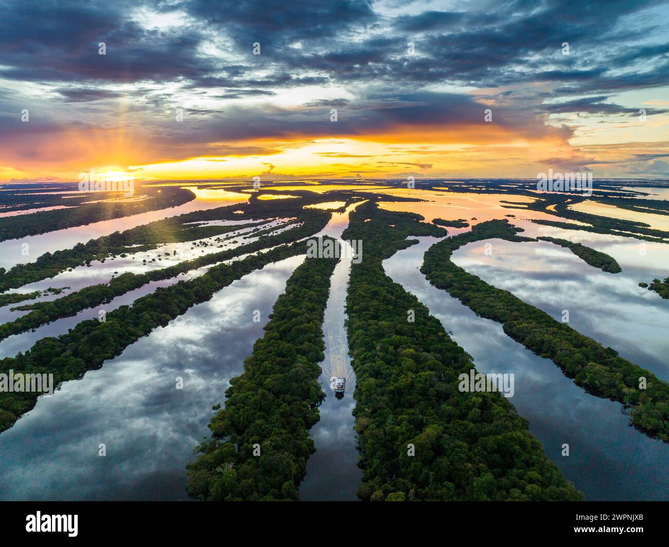 Amazon in the Brazilian rainforest with small boutique ship Stock Photo ...